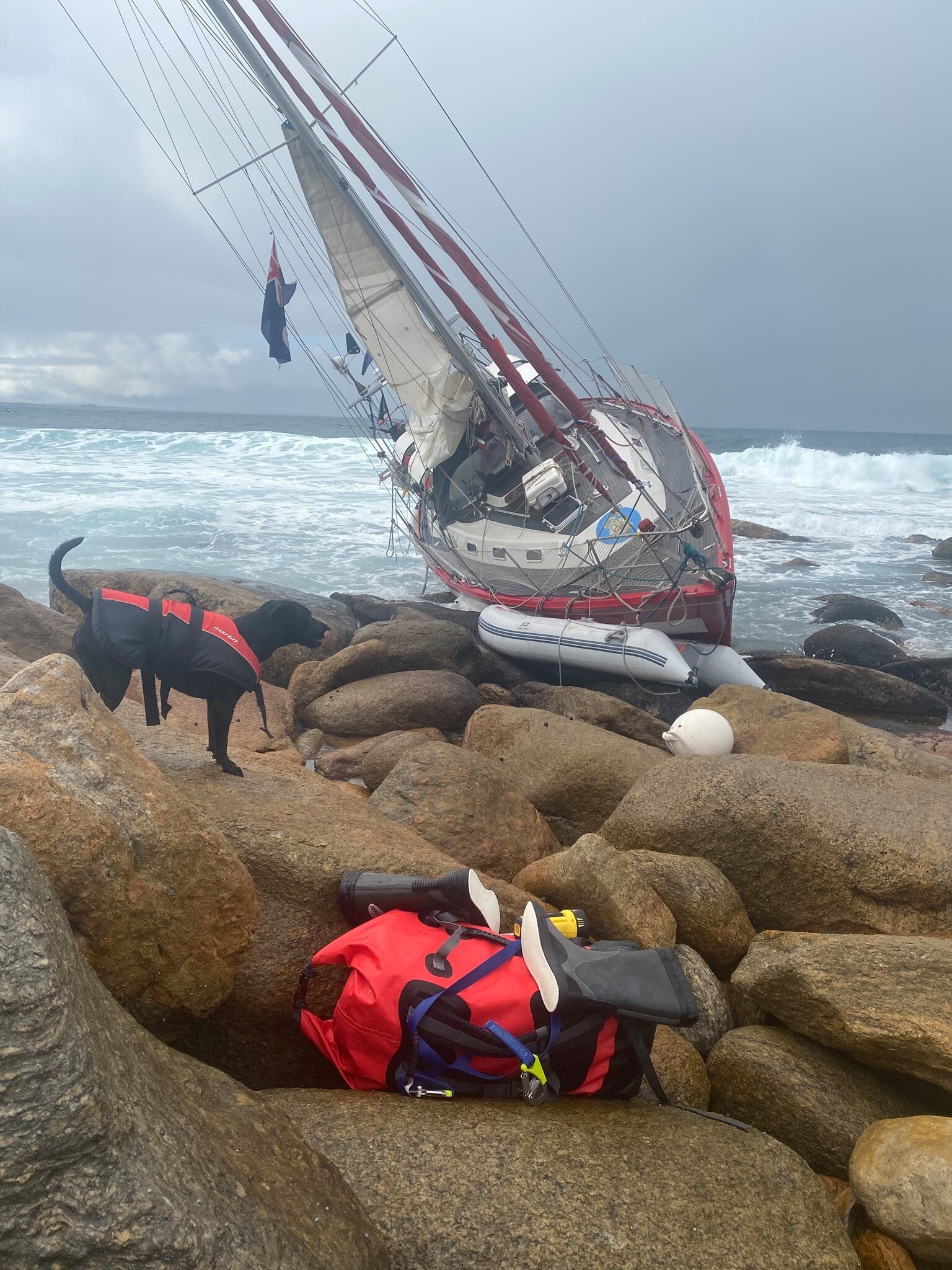 Charity sailor rescued after yacht crashes into rocks off South ...
