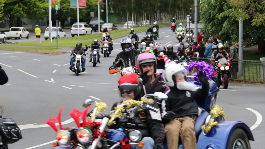 The Salvation Army applauds Santa's helpers two-wheel toy run - ABC News