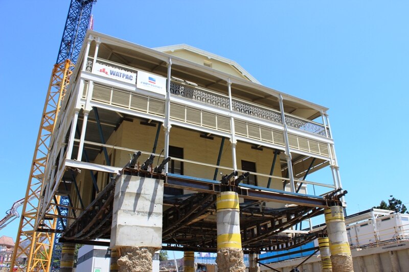 Up in the air: Historic Queensland building goes sky-high for new ...