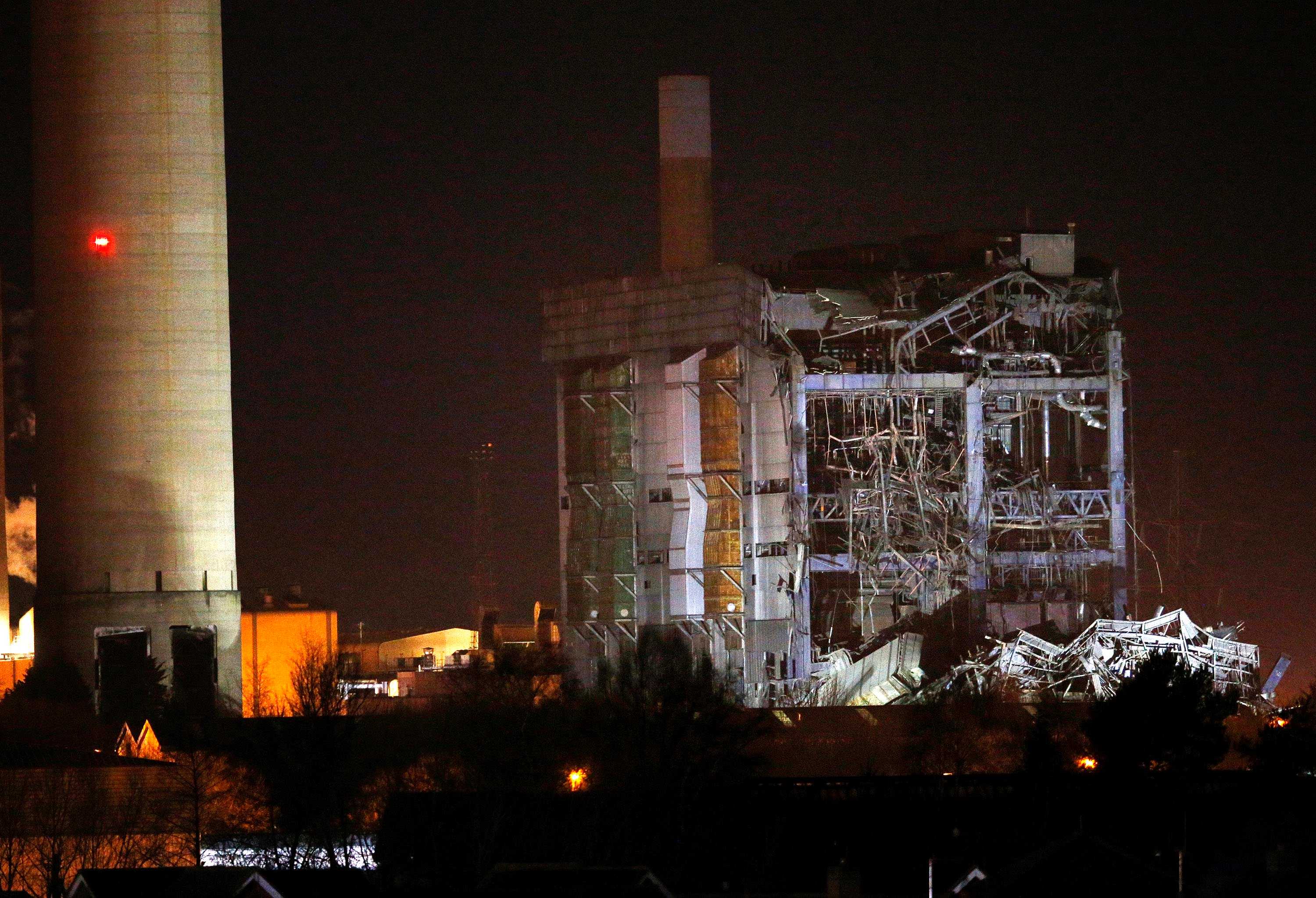 One dead, three missing after UK power station collapses, fire ...