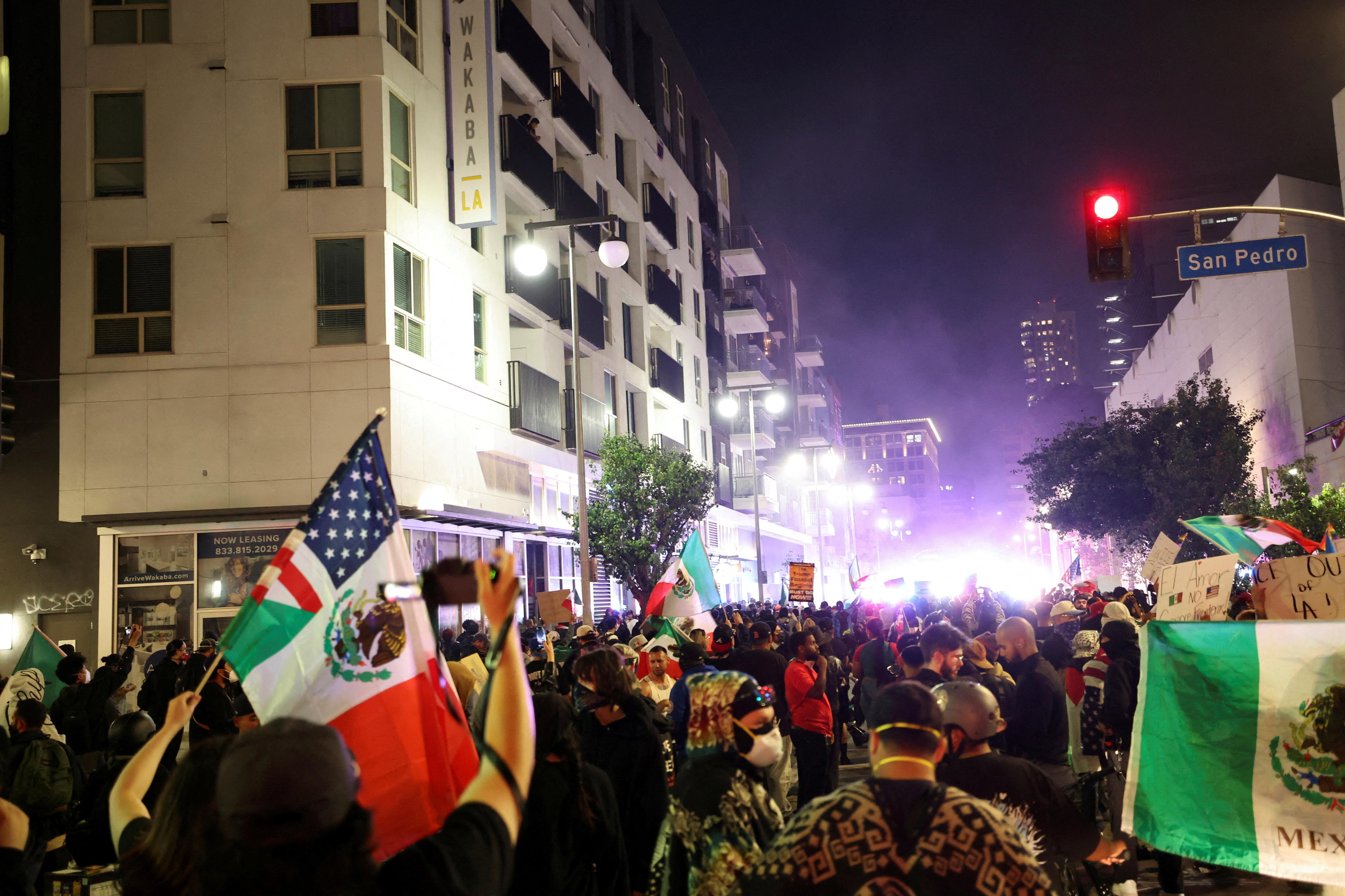 Crowds set off fireworks in Los Angeles on fourth night of protests ...