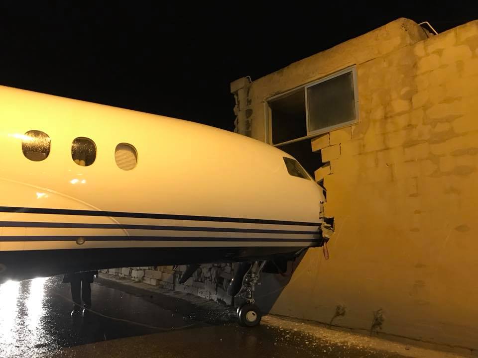 Private plane blown off runway and into building near Malta ...