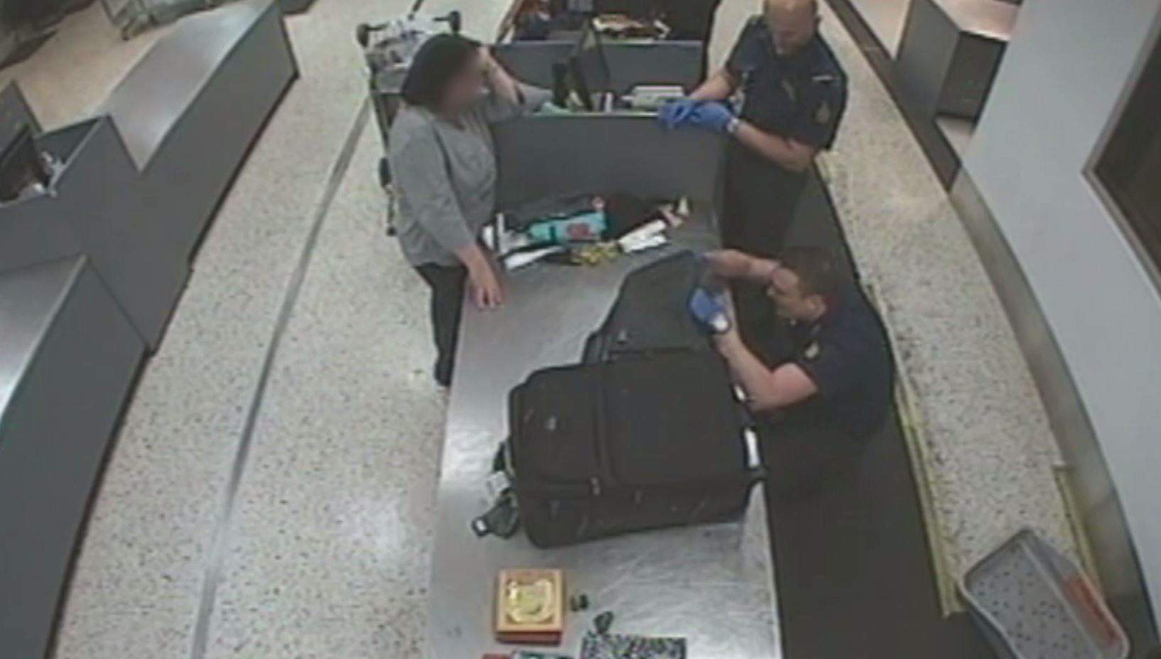Kay Smith collapses onto the floor of Melbourne Airport after having ...