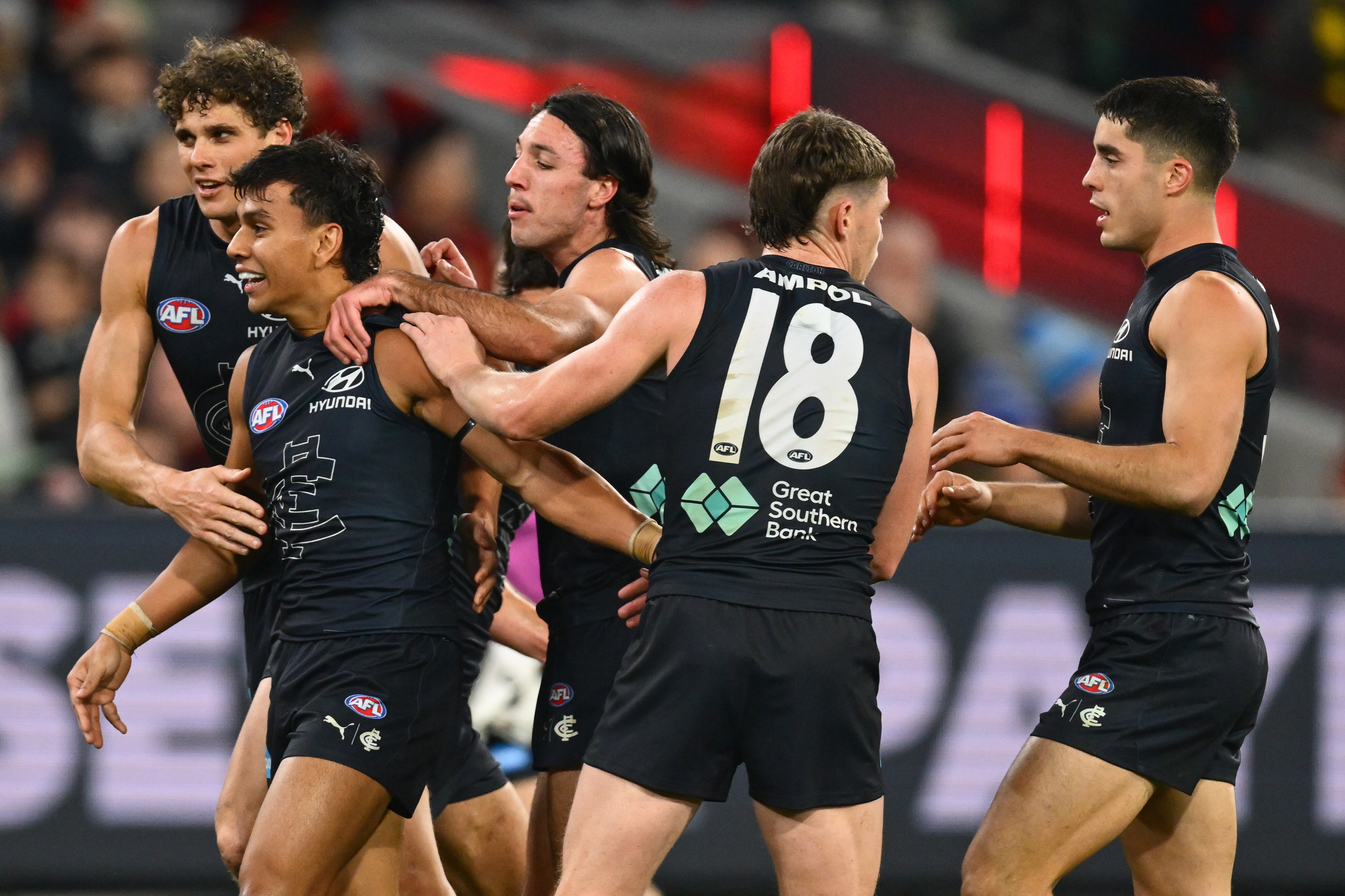 Sam Durham bump in the spotlight as Carlton beats Essendon, Kangaroos ...