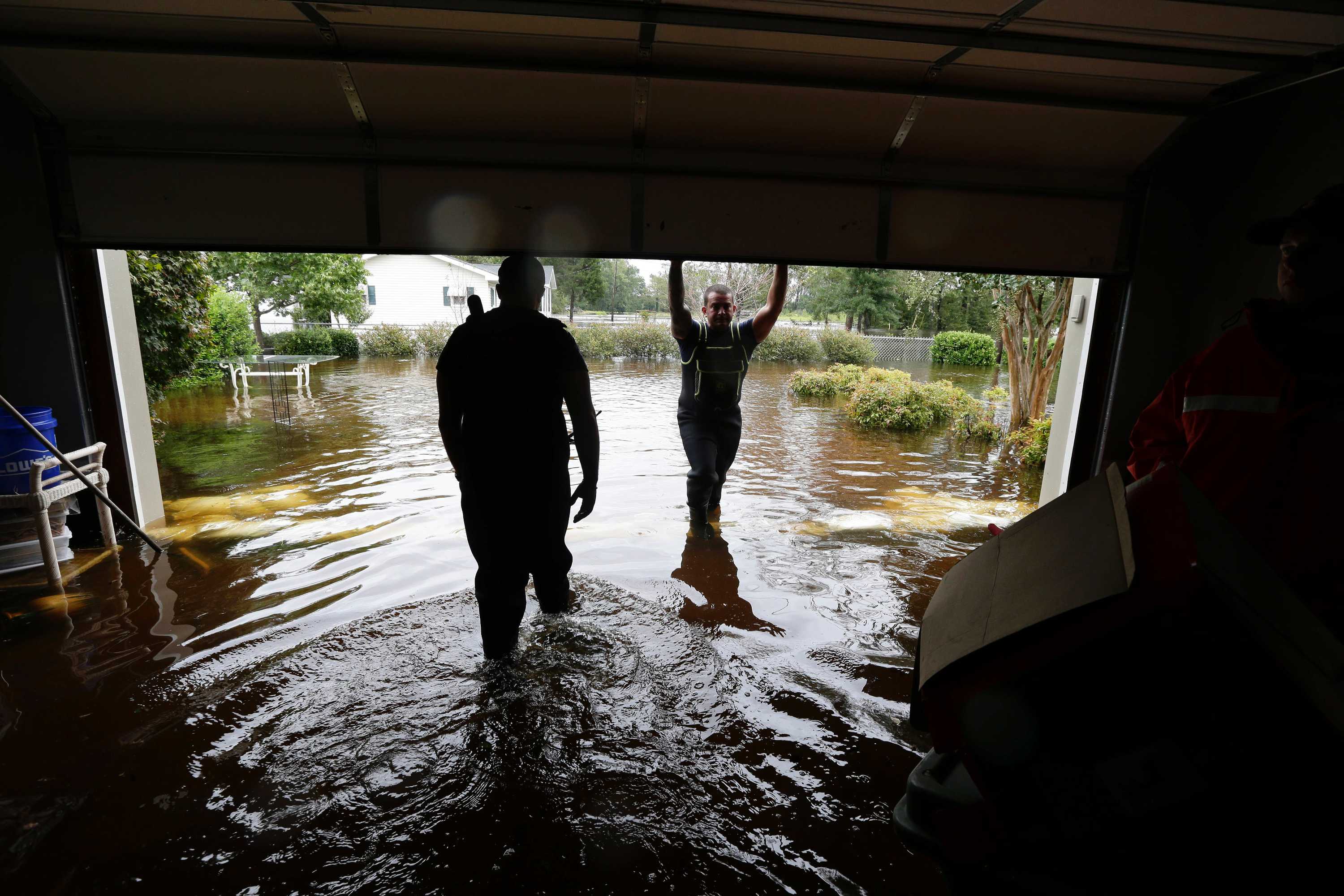 Florence set to bring record rainfalls of more than 50cm as flooding ...