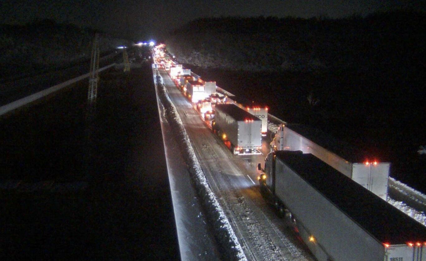 Motorists trapped for 20 hours on an impassable stretch of highway as ...