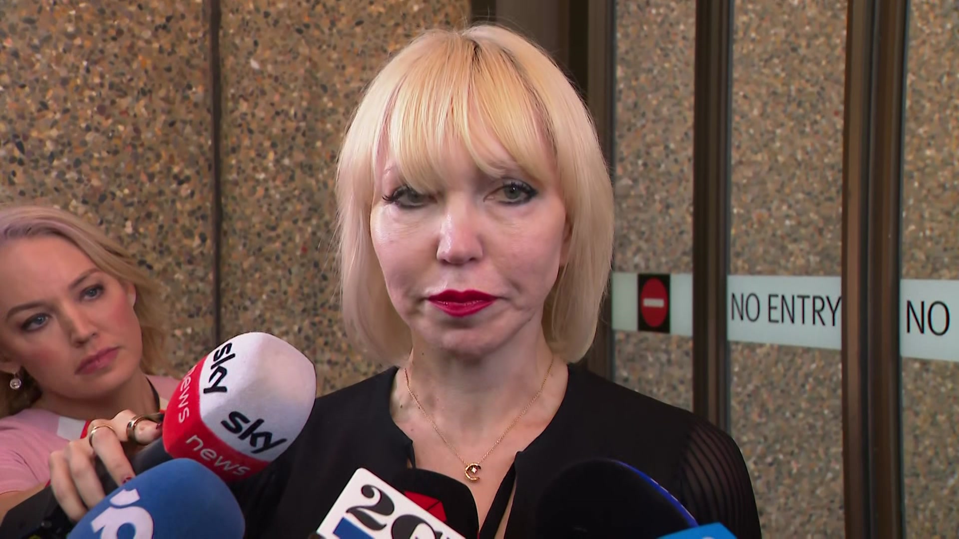 Zali Burrows speaks outside the Federal Court - ABC News