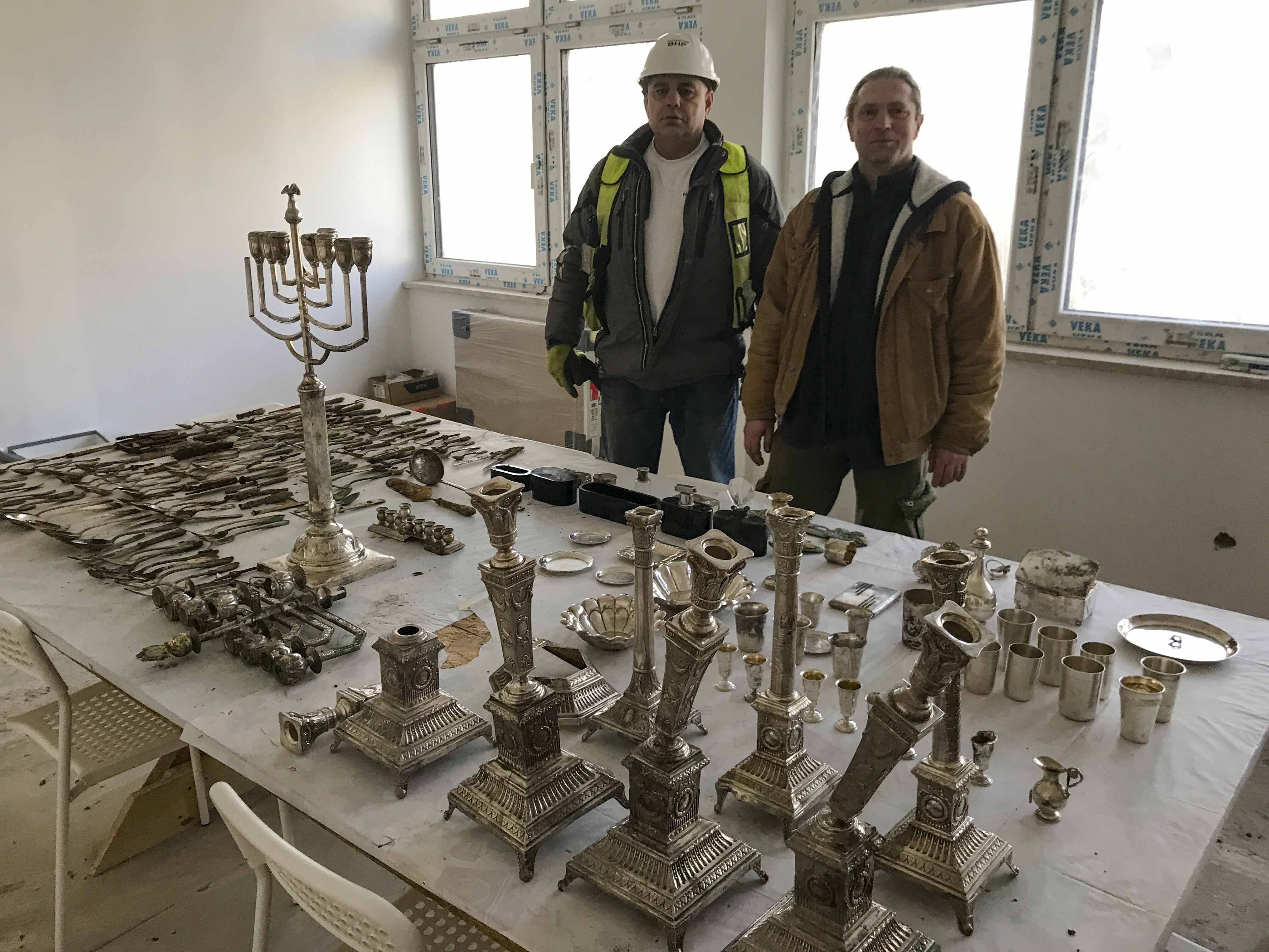 Silver-plated menorahs, tableware hidden by Jewish owners during WWII ...