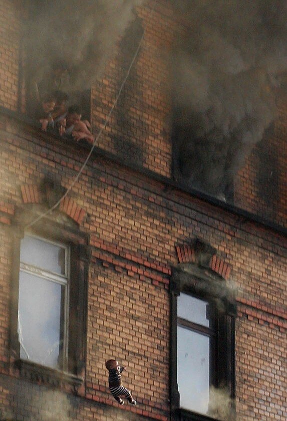 Children thrown from deadly apartment building fire - ABC News