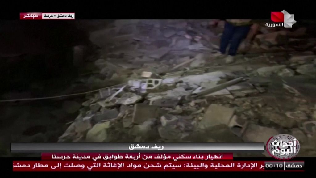 Four-storey building collapses in suburb of Syria's capital - ABC News