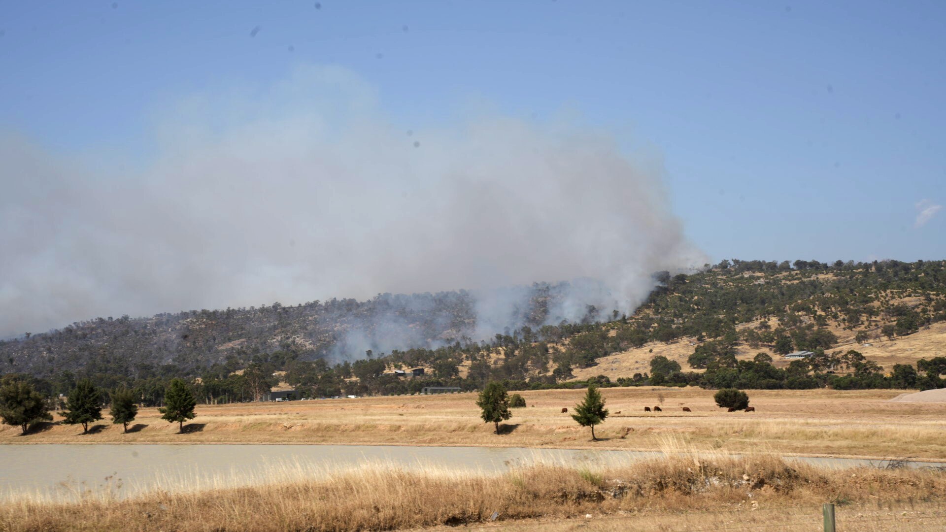 Two bushfires downgraded from emergency warnings in Bullsbrook and ...