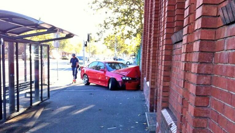 Car crashes into wall in city street - ABC News