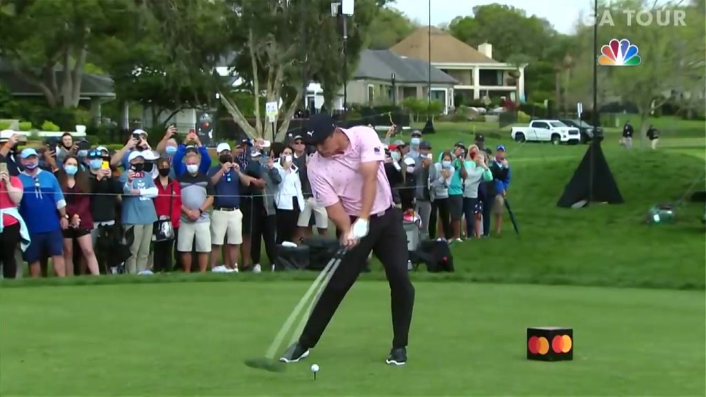 Bryson DeChambeau smashes golf ball 370 yards over lake - ABC News