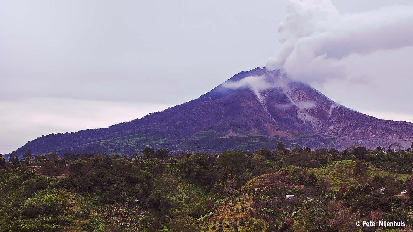 Sleeping Volcanoes - Behind The News