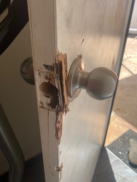 Barricades and bulletproof doors in a town fortifying itself against ...