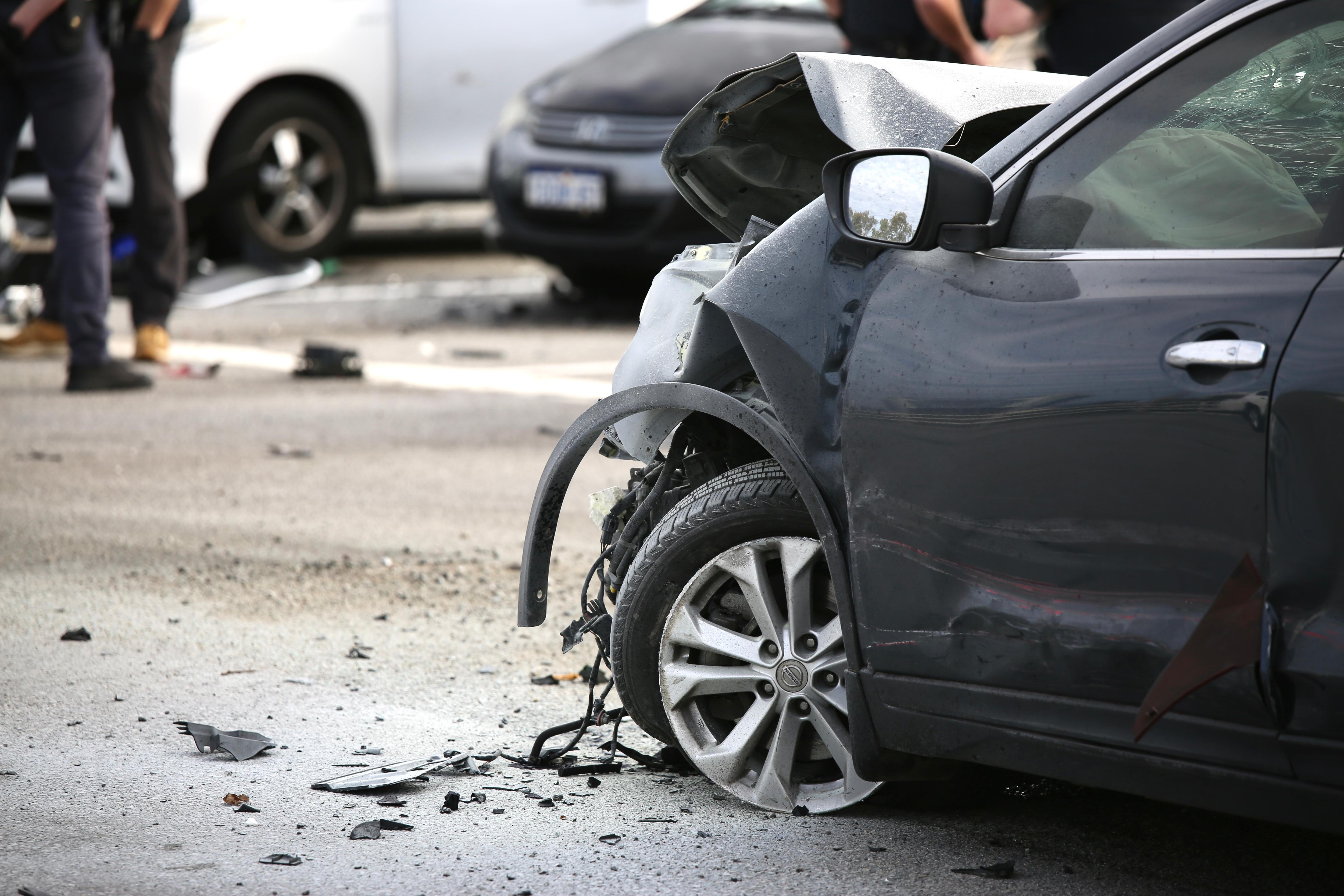 Car pursued by police smashes into East Perth traffic light pole ...
