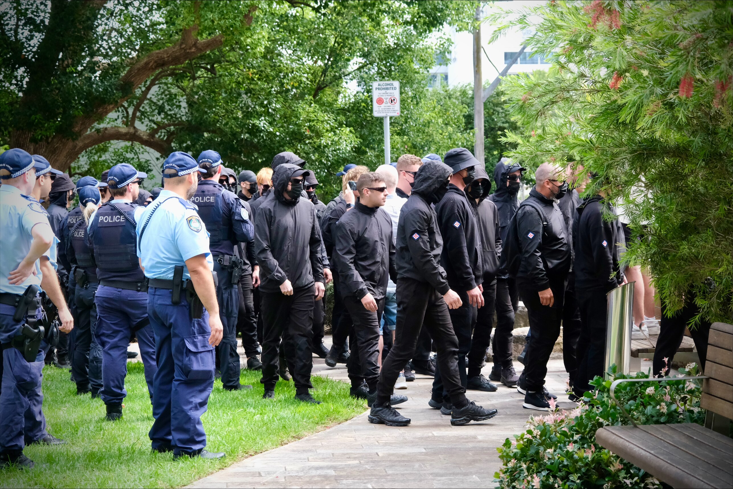 Six people arrested after masked men clad in black spark police ...