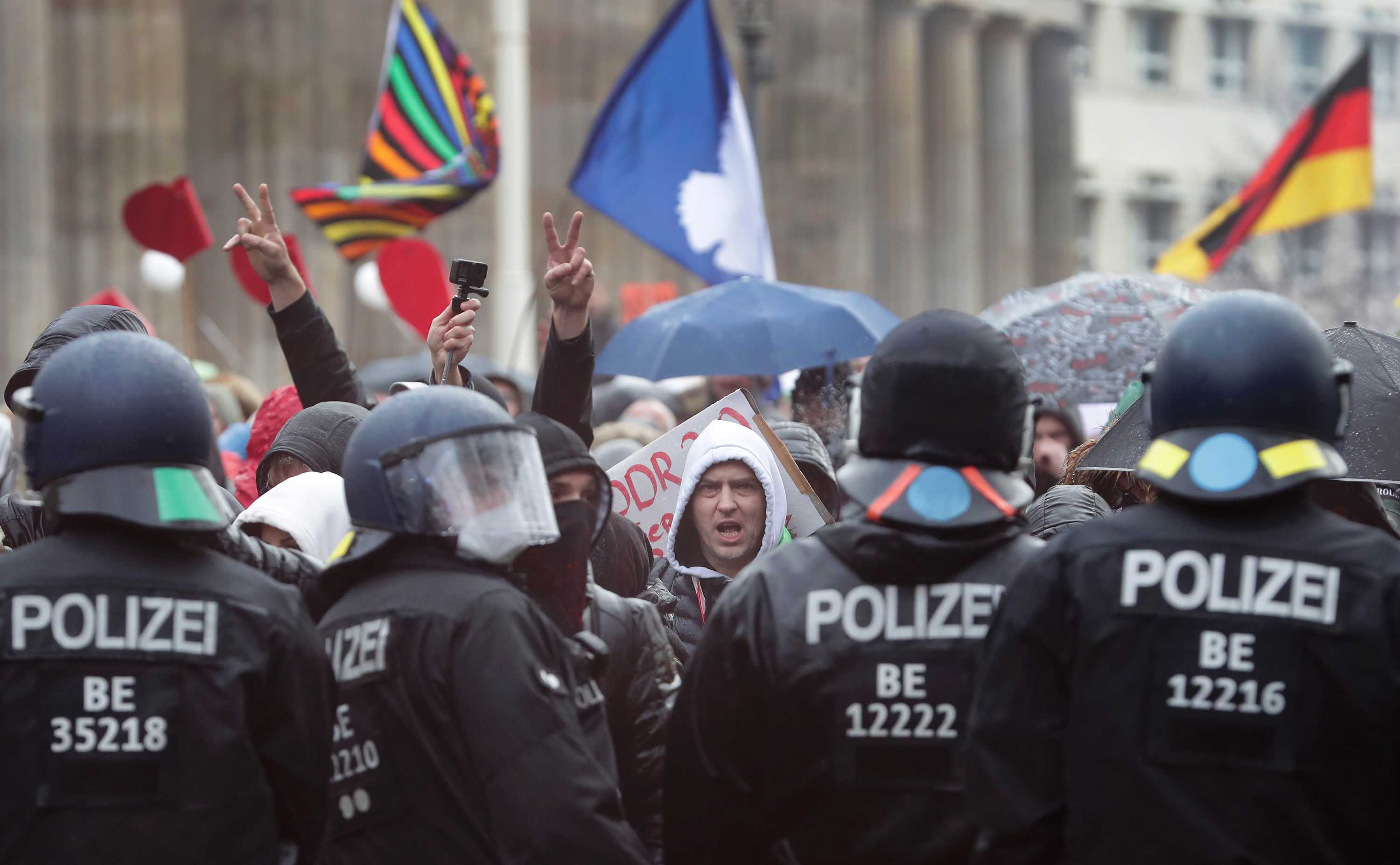 Germans protesting against coronavirus restrictions clash with German ...