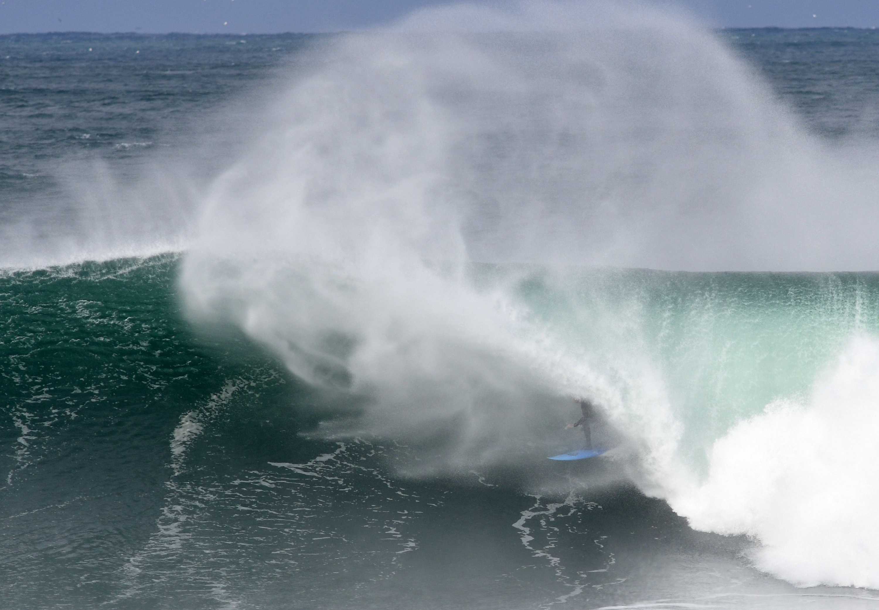 Tim Dickson rides the wave of the day during Newcastle's 'Big Saturday ...