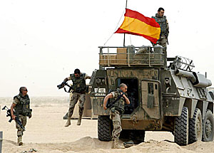 Spain gives 14-days notice in Iraq - ABC News