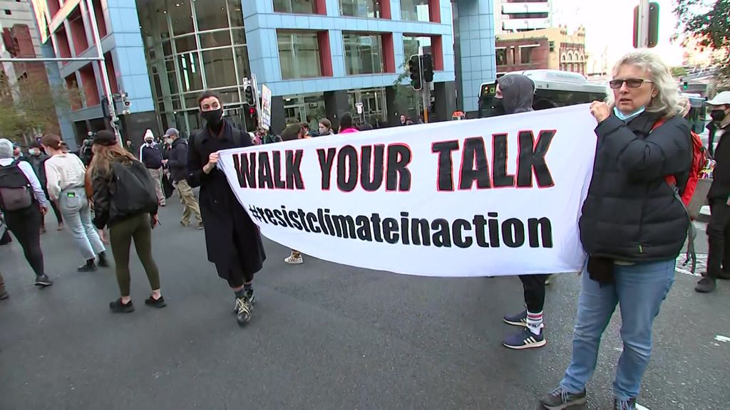Climate activists march across Sydney' CBD - ABC News