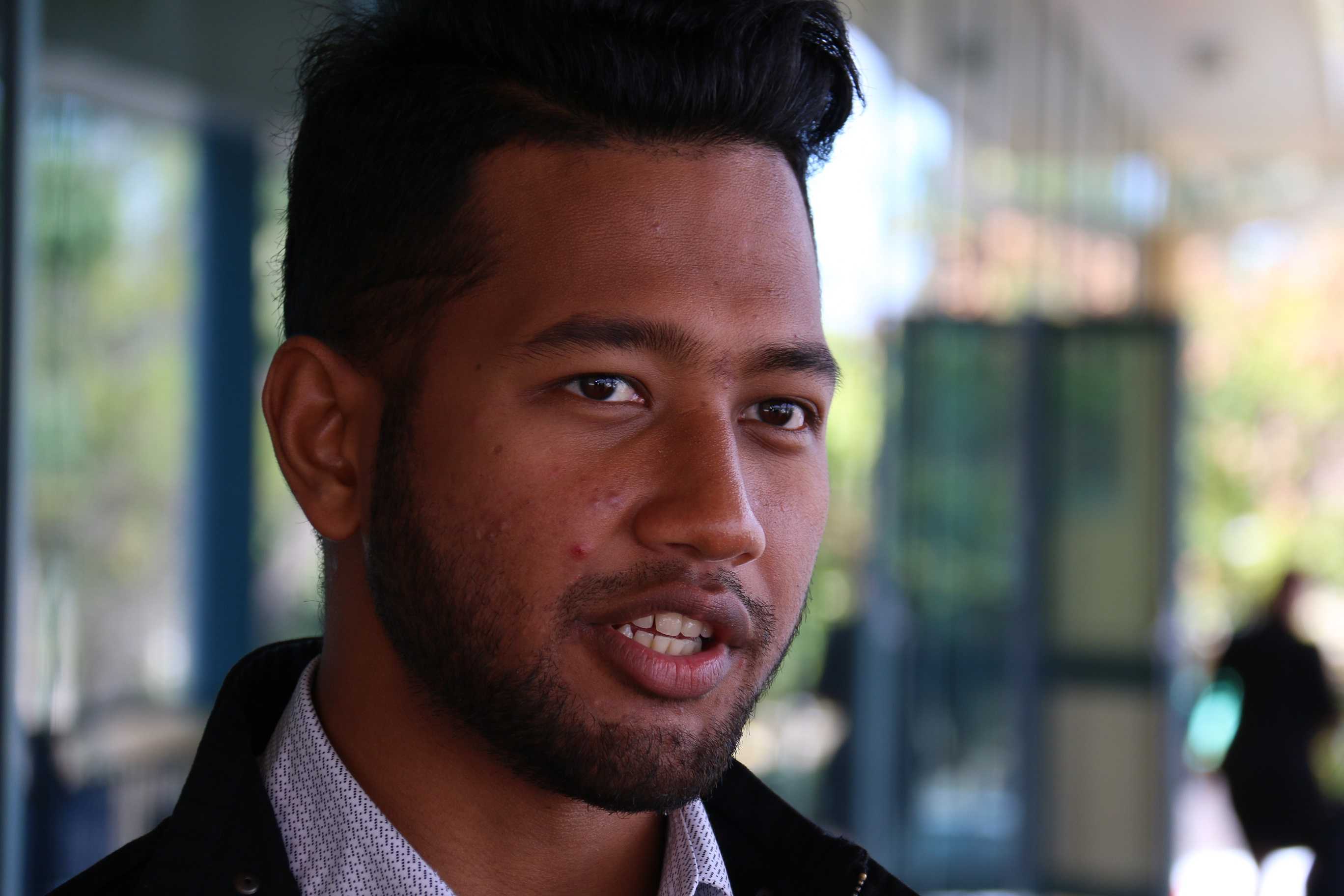 Burmese refugee who lost family at sea now helping others resettle ...