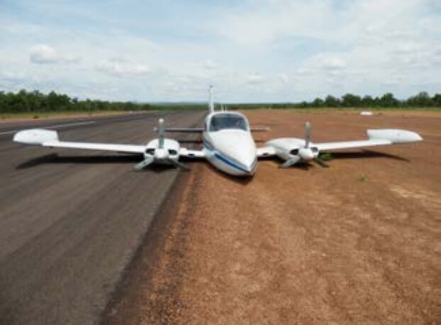 Top End pilot distracted by coughing passenger, forgot to lower landing ...