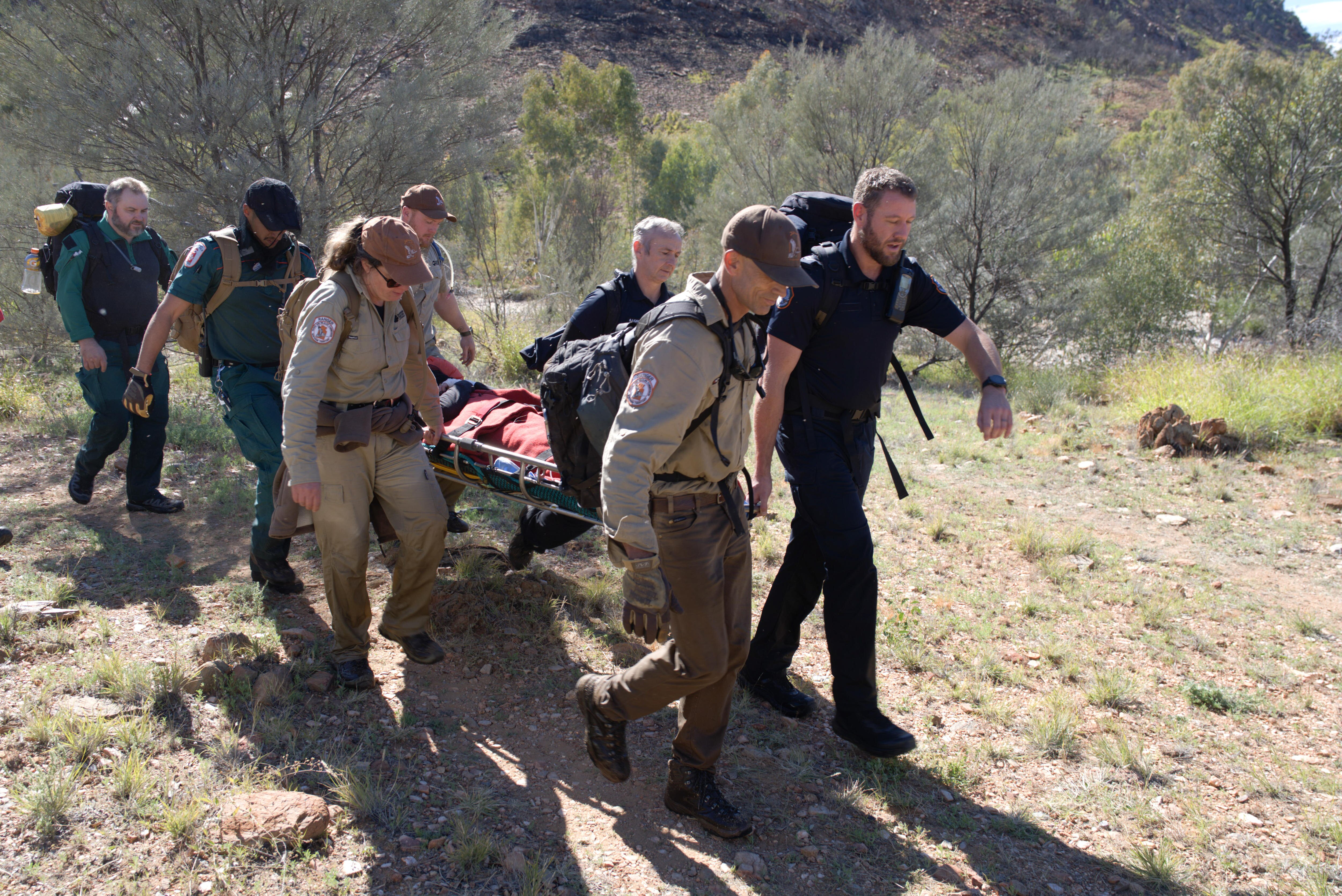 Rescue crew treks rugged Larapinta Trail terrain to carry out hiker ...