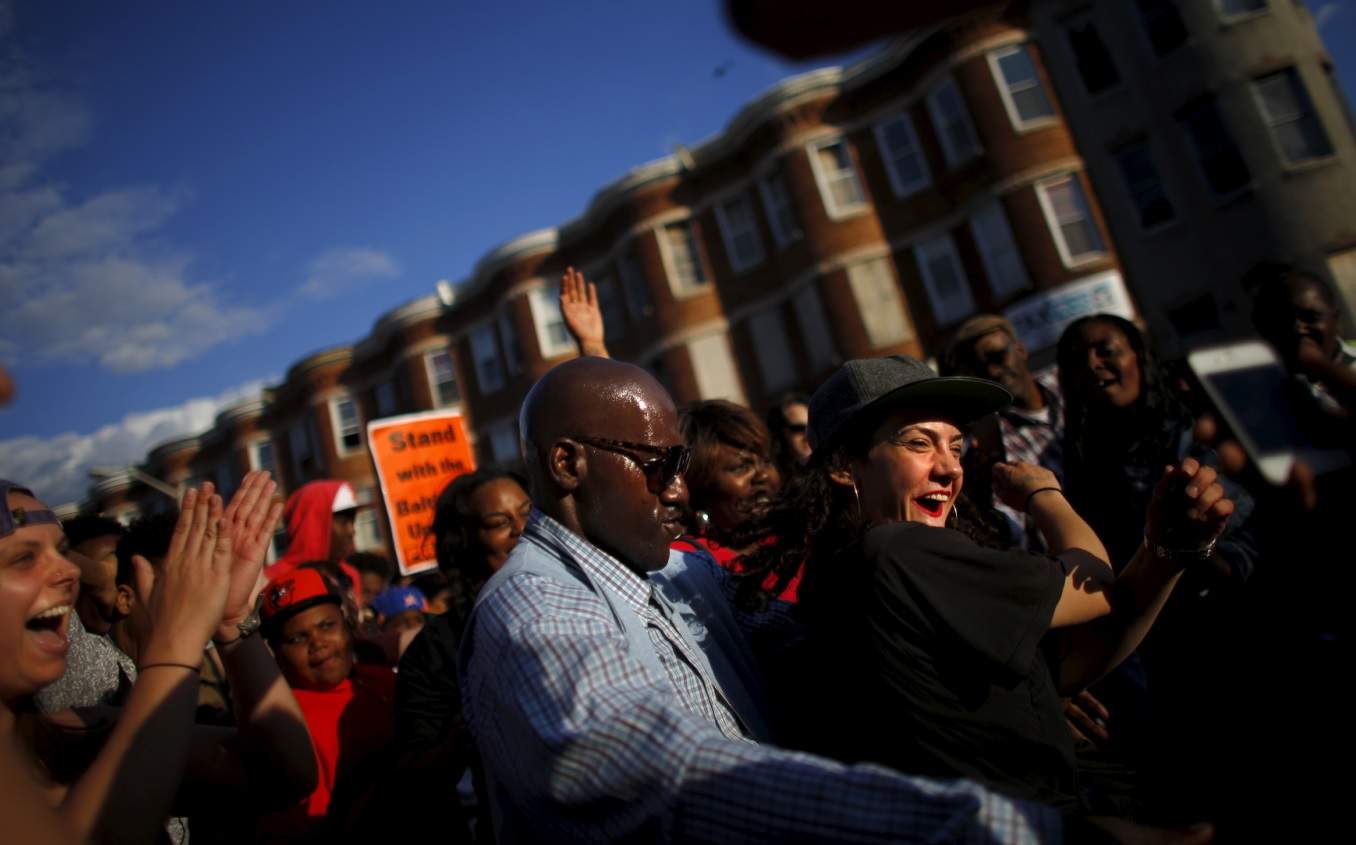 Baltimore protests: Street party erupts after six police officers ...