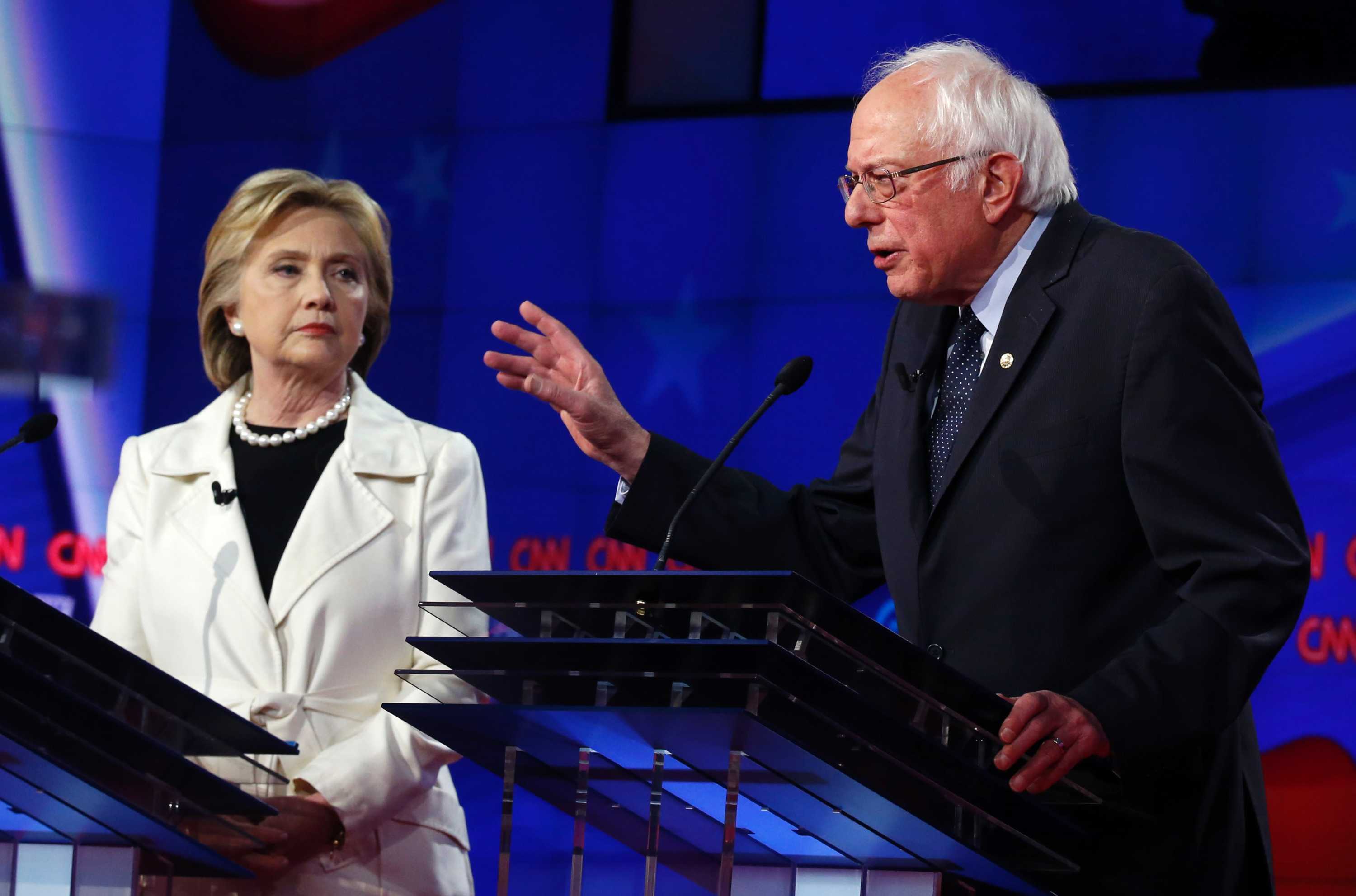 US election: Hillary Clinton, Bernie Sanders spar in feisty Brooklyn ...
