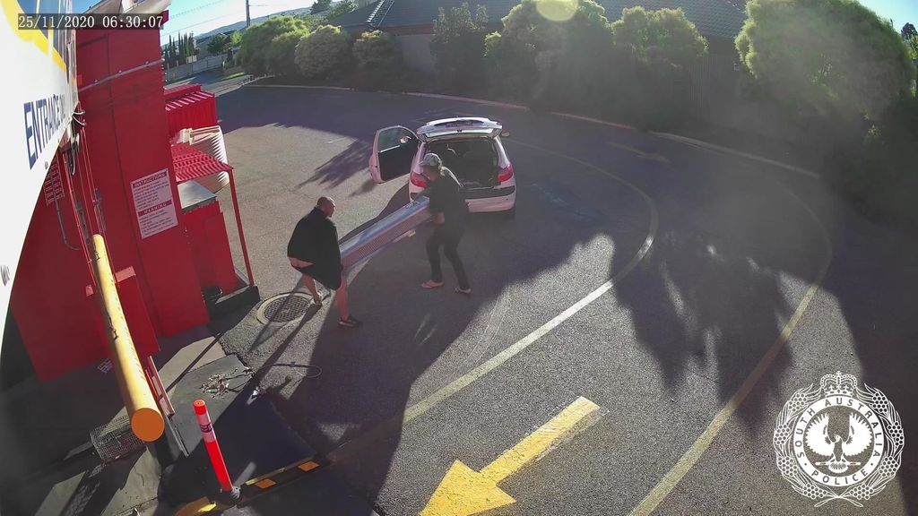 Police release vision of two men stealing pay machine - ABC News