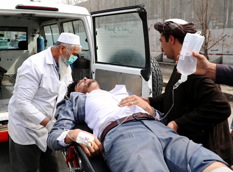 Gunmen kill at least 27 in Kabul ceremony attack attended by top ...