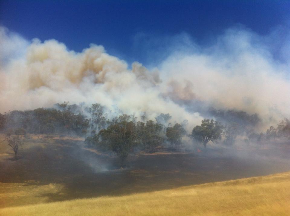 Remote grassland fire burning south of Yass sends smoke over Canberra ...