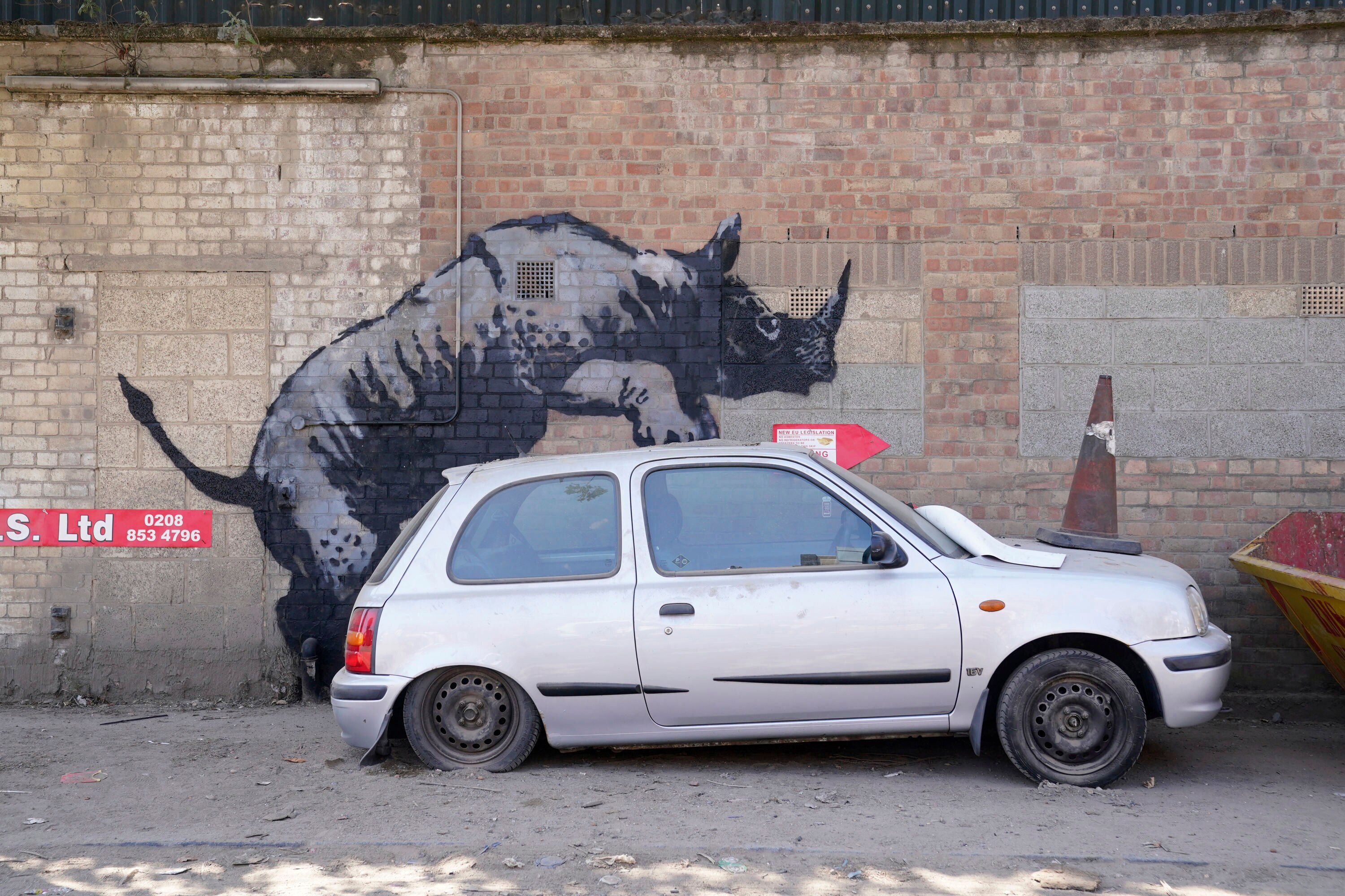 Banksy unveils rhino as eighth artwork in animal-themed series across ...