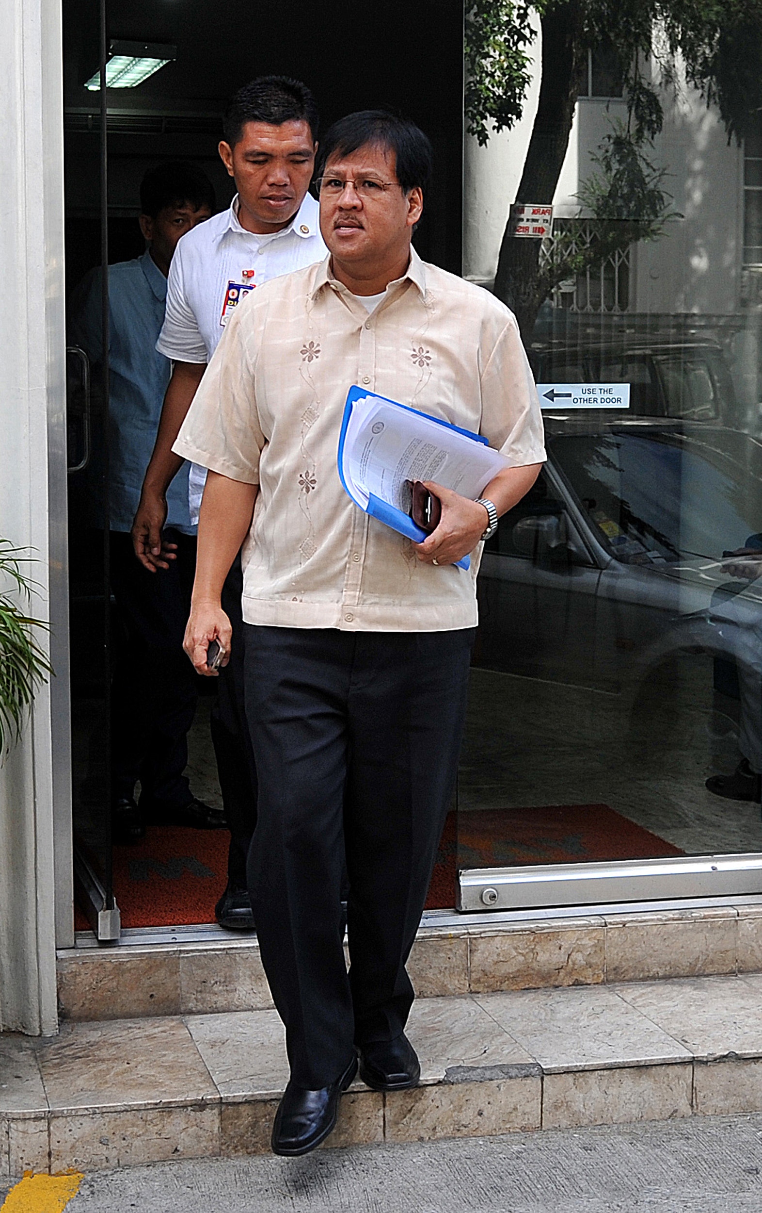 Search widens for missing Philippine minister - ABC News