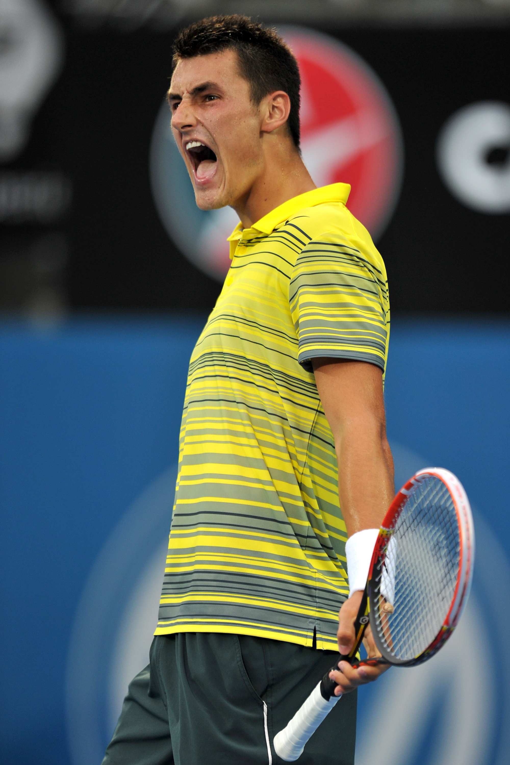 Bernard Tomic beats Alexandr Dolgopolov to progress to Sydney ...