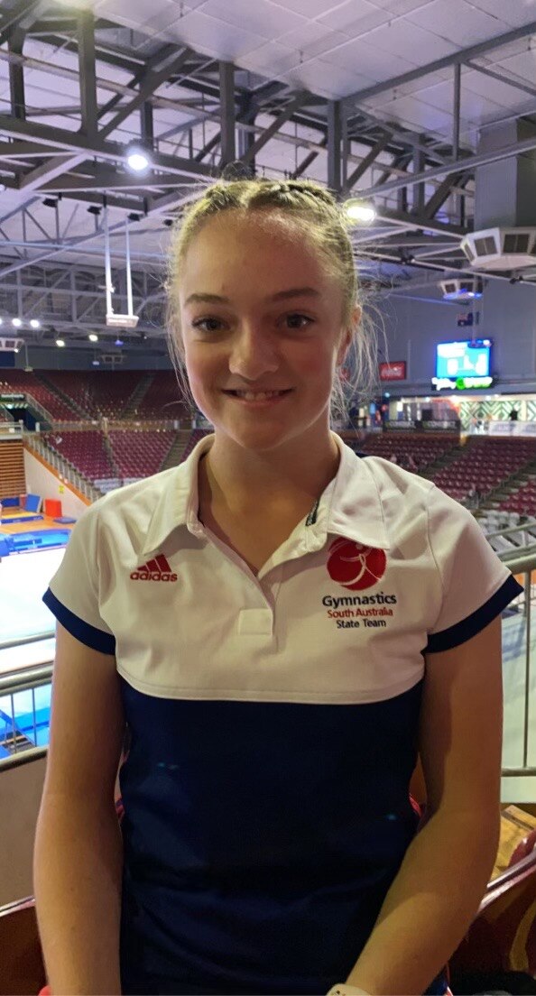 Trampolinist wins age group despite being injured - ABC listen