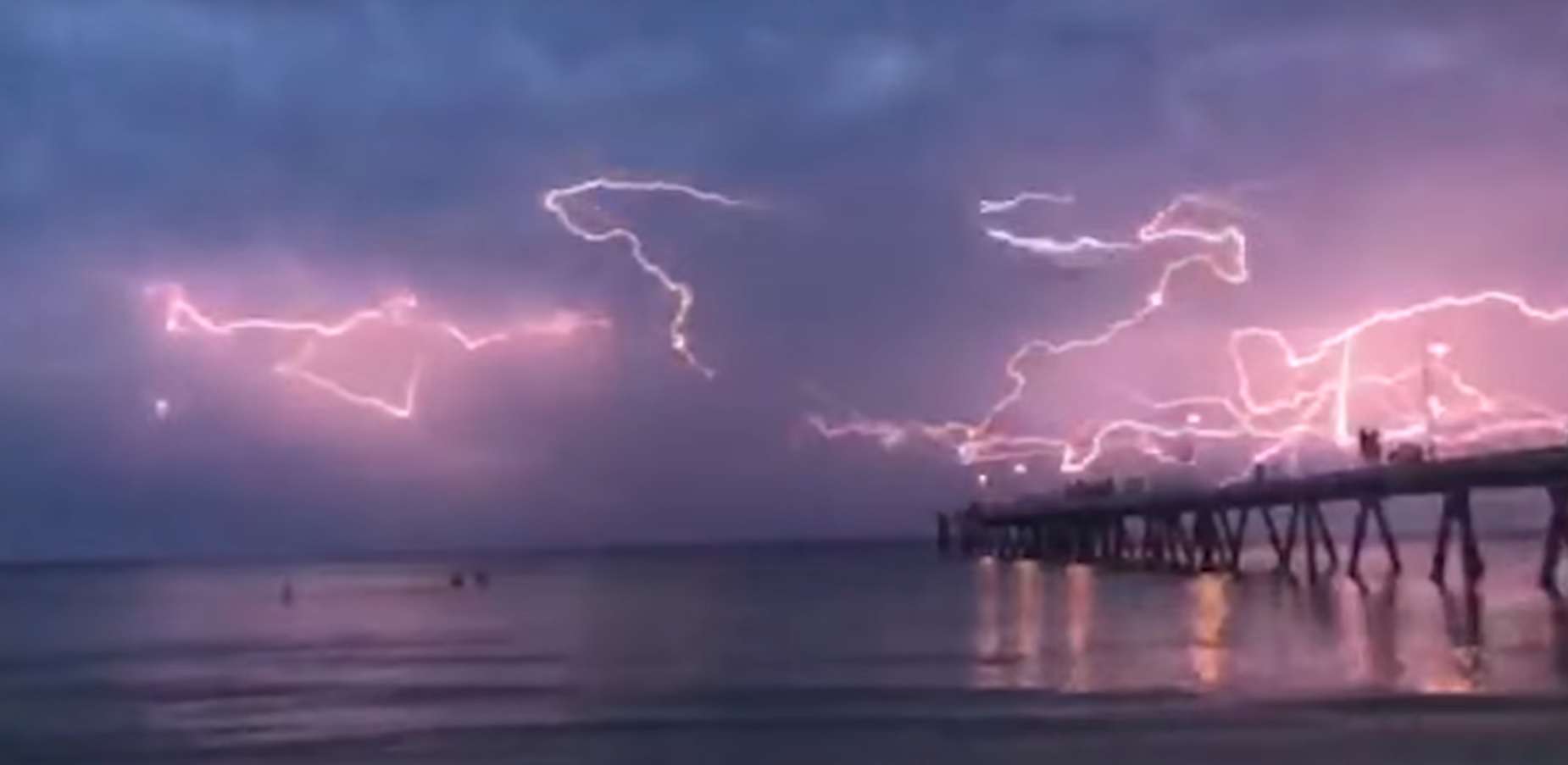 Spectacular 'spider lightning' lights up Glenelg beach during storms ...