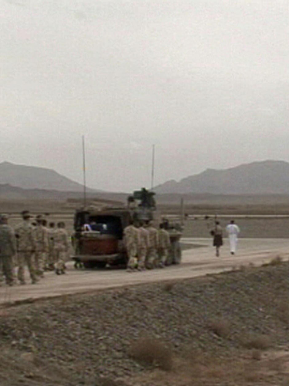 Soldiers farewell fallen digger in Afghanistan - ABC News