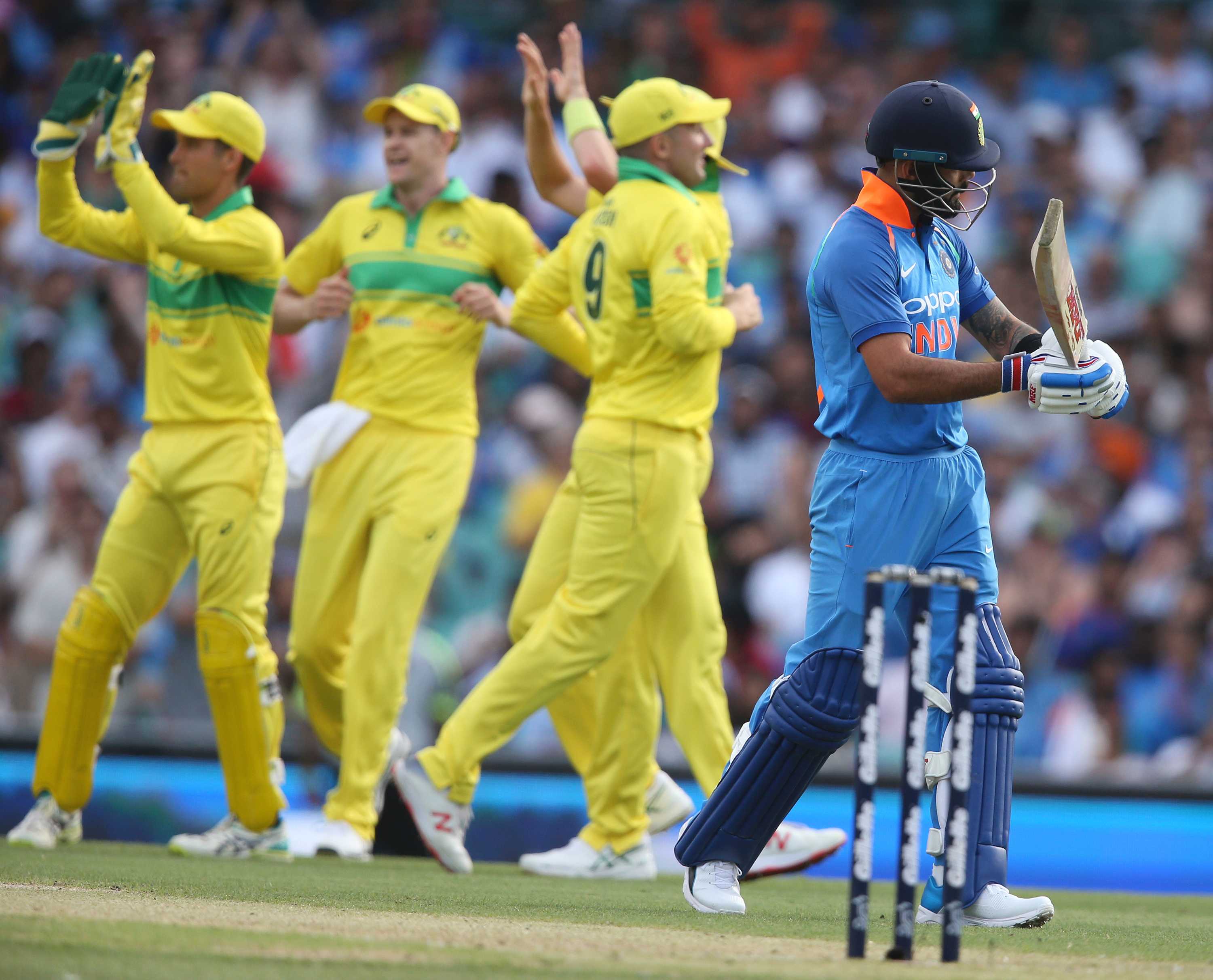 Australia beats India by 34 runs in the first ODI at the SCG, Rohit ...