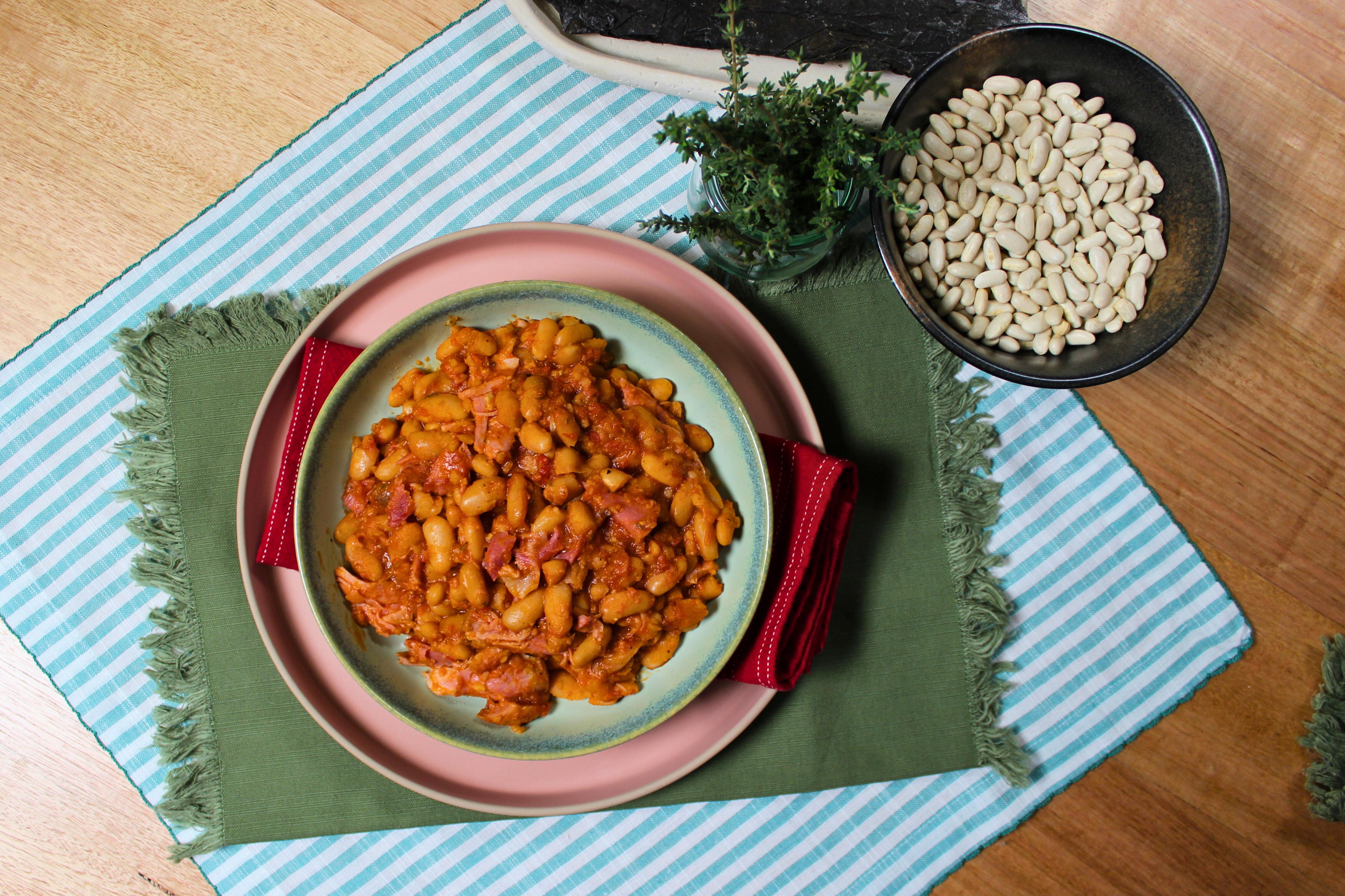 Slow-baked beans with ham hock — big flavour, low effort - ABC News