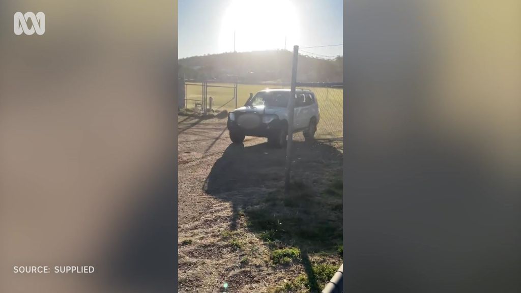 Driver rams down a fence in a vehicle at an oval in Mount Isa. - ABC News