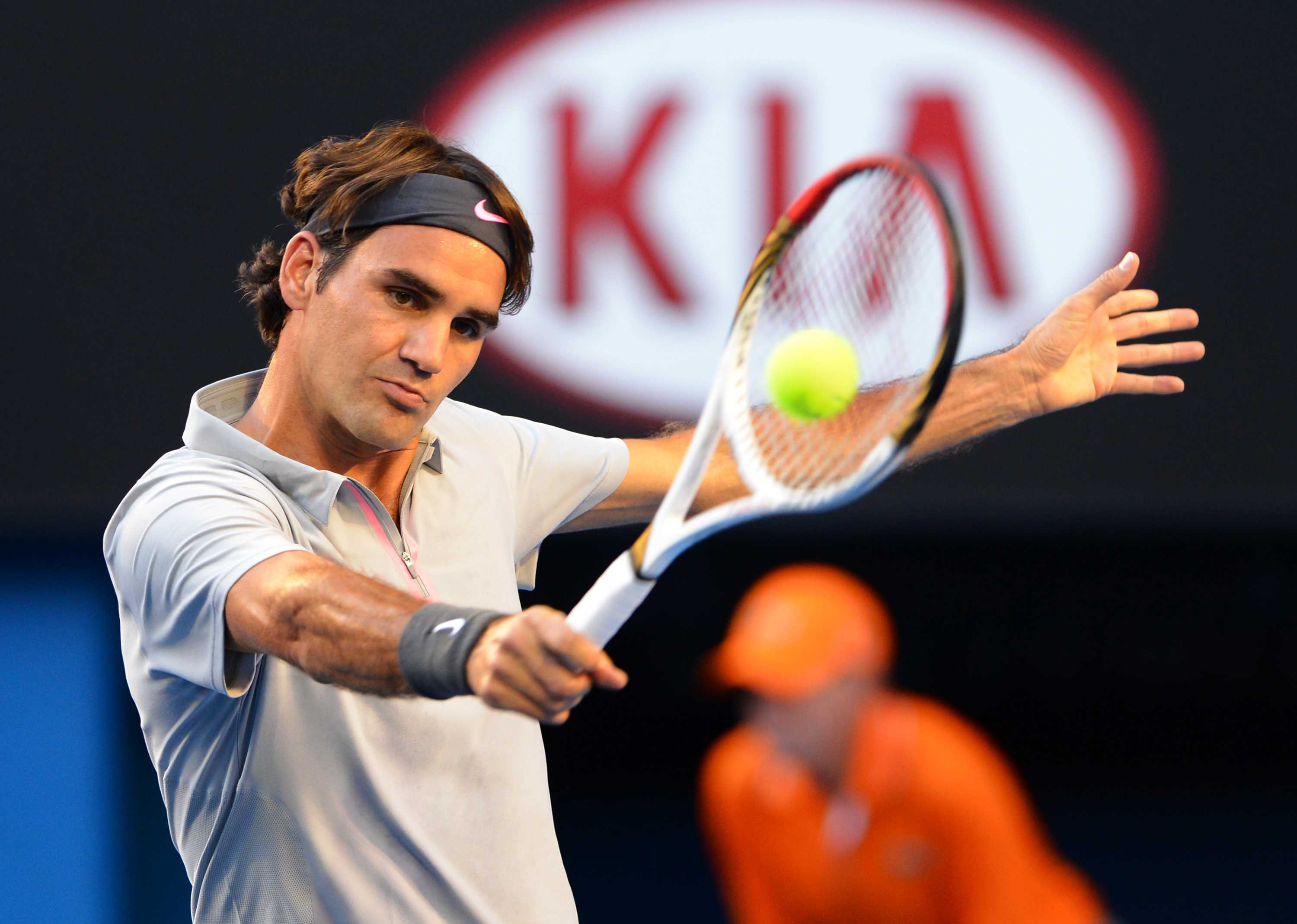 Federer sets up Tomic showdown - ABC News