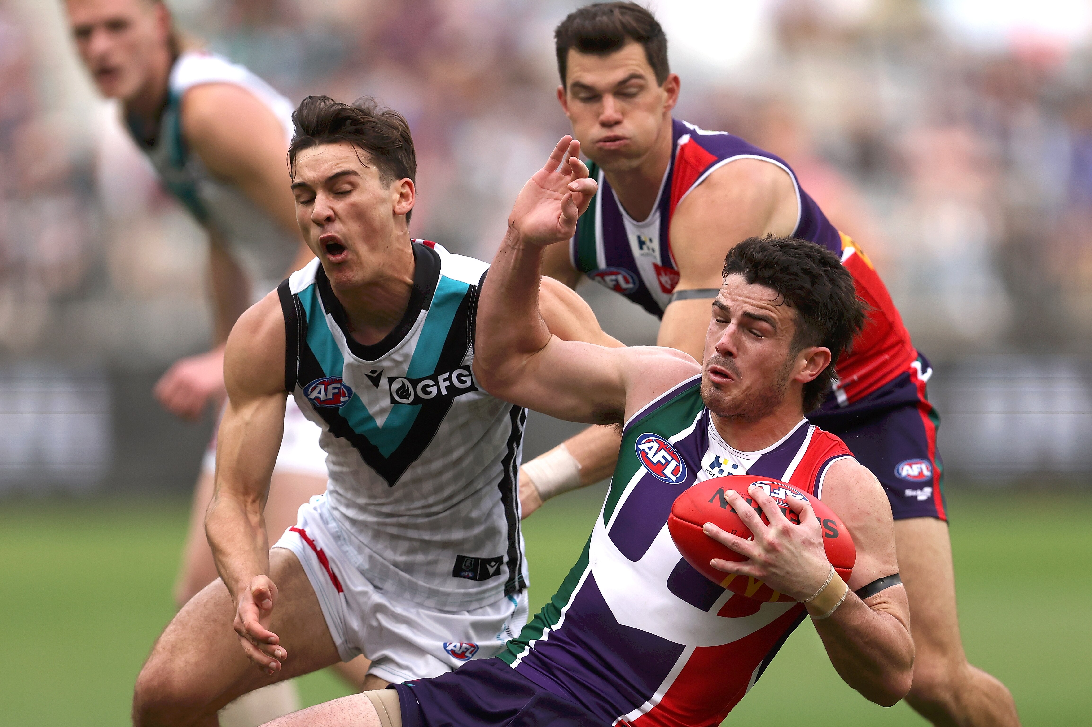 Port Adelaide beat Fremantle and Melbourne defeat Hawthorn to lock in ...