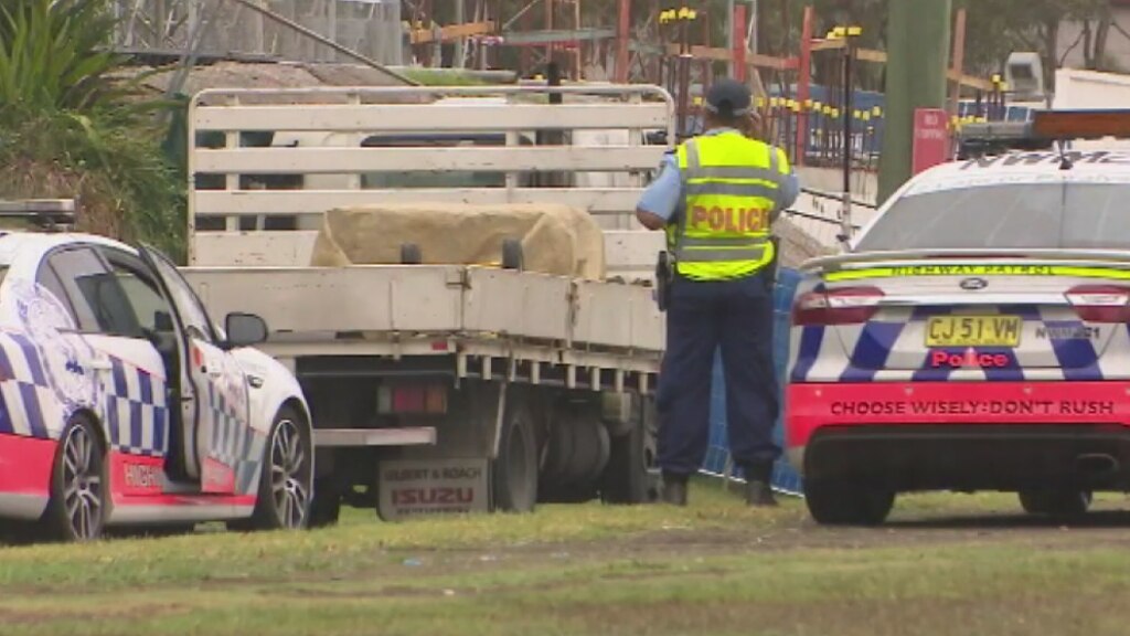 Driver killed by semitrailer after police pull him over in Sydney's ...