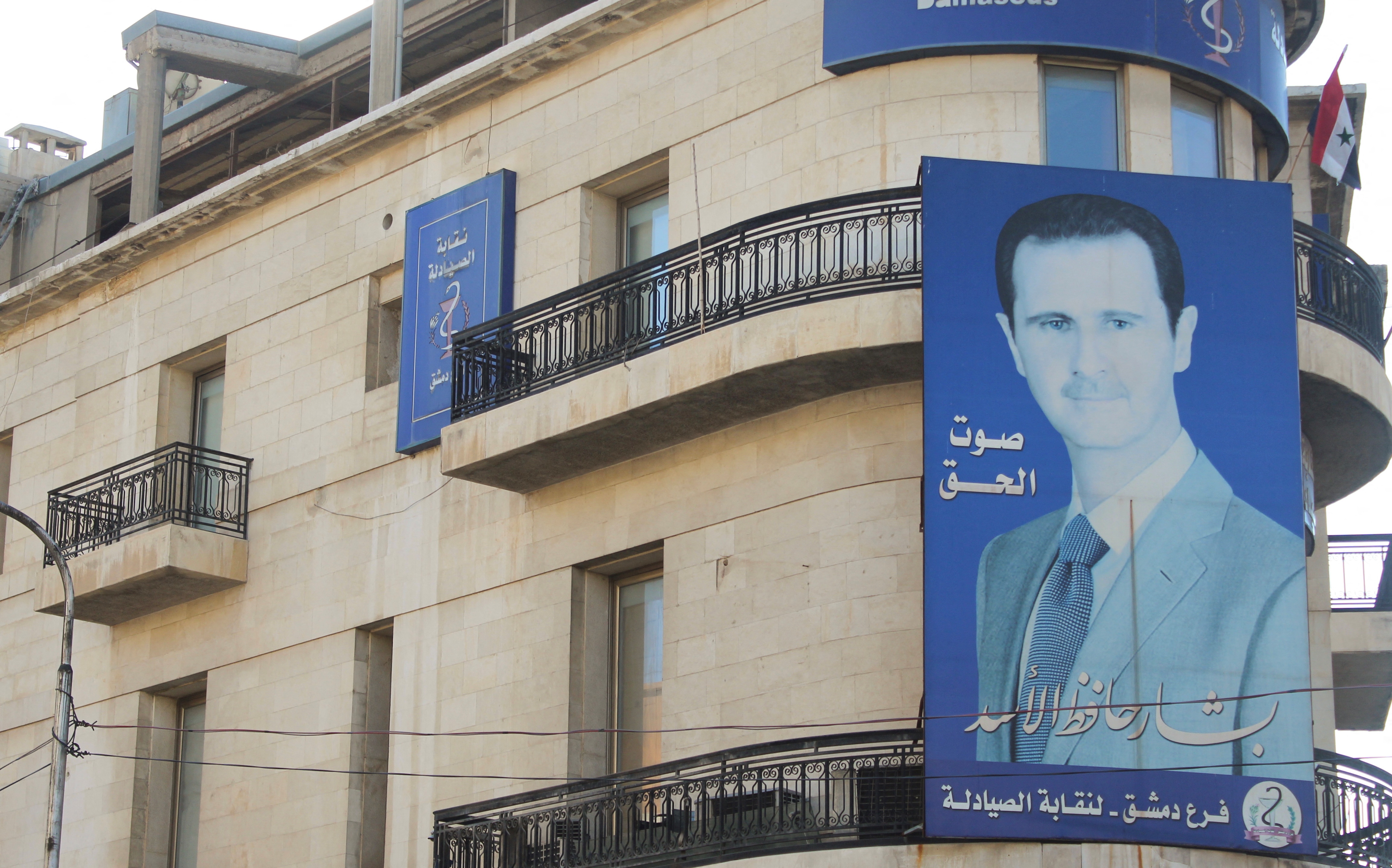 Rebels in Syria announce capture of Homs as insurgents encircle ...