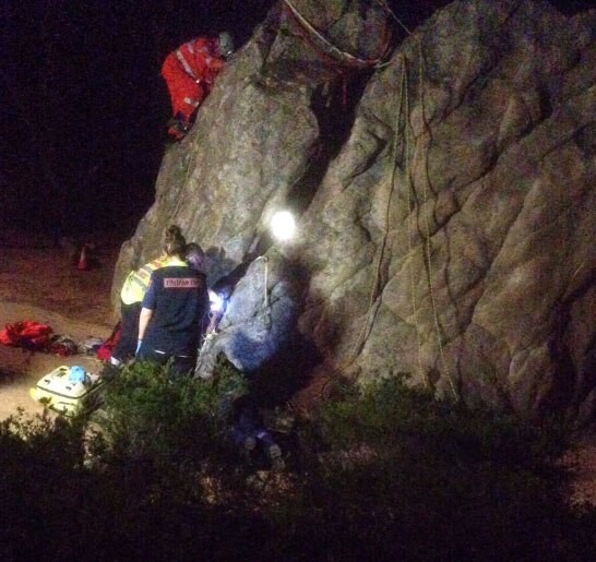 Emergency crews rescue climber caught between two boulders at Mount ...