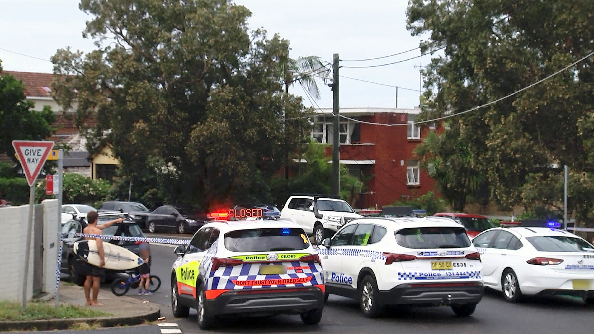 Sydney lawyer Mitch East was lying on the road before allegedly being ...