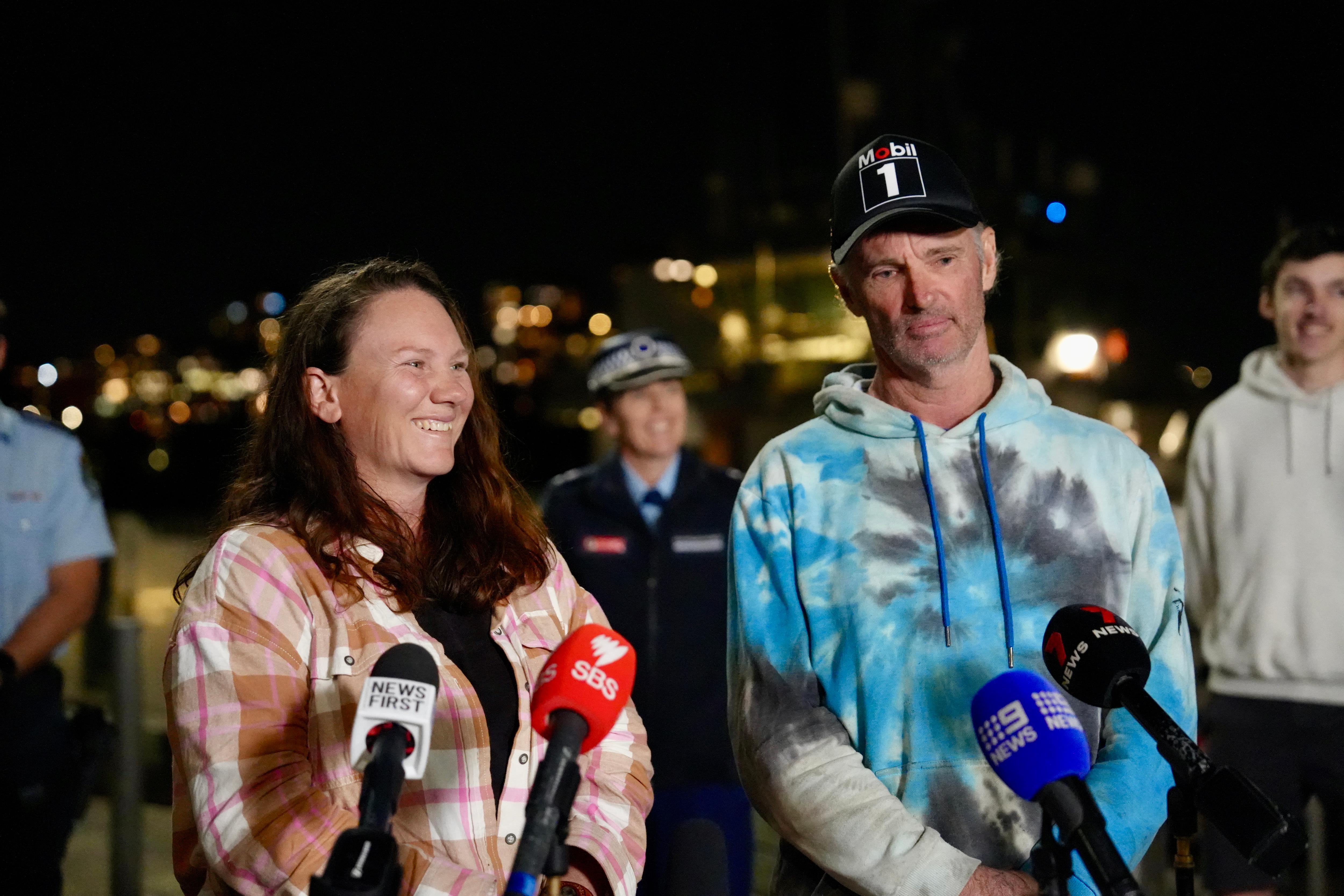 Sailors met by family on dry land after yacht rescue in 'horrendous ...