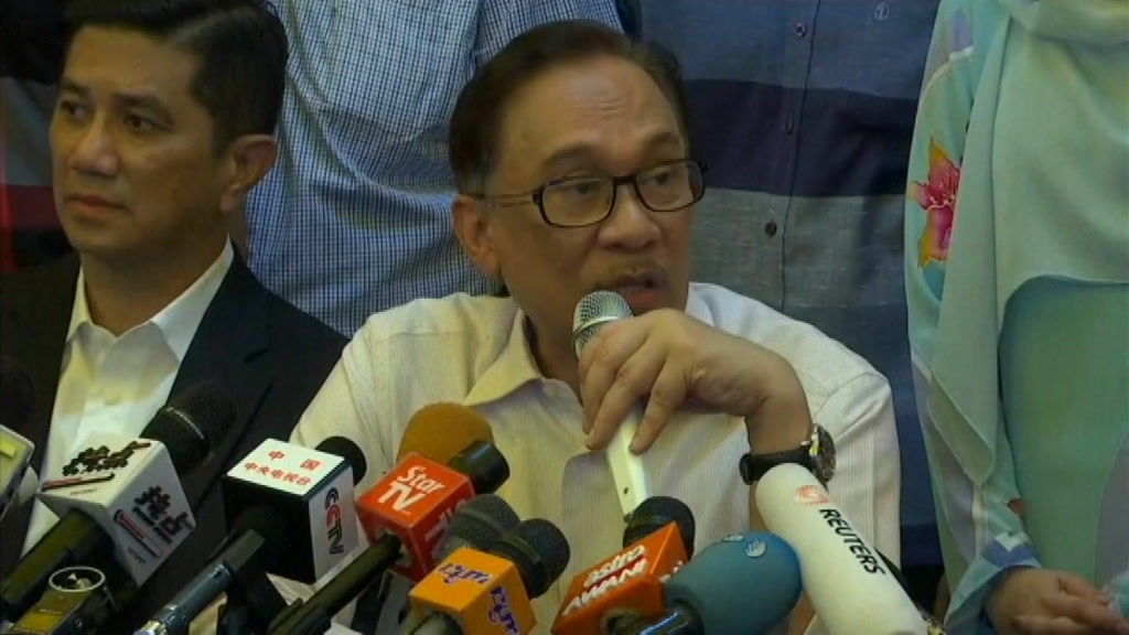 Anwar Ibrahim released after years in prison in 'new dawn for Malaysia ...